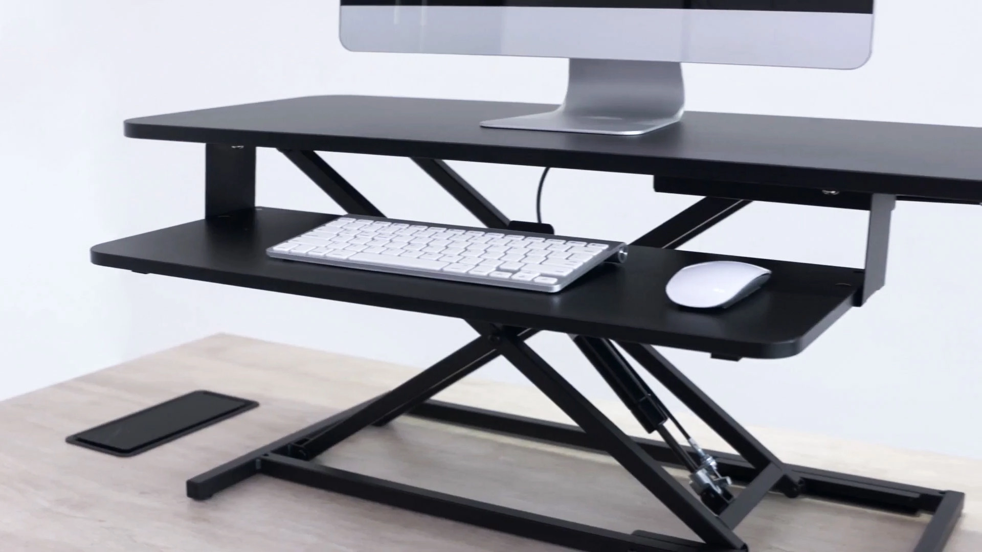 Mount-It Standing Desk Converter makes any desk more ergonomic.